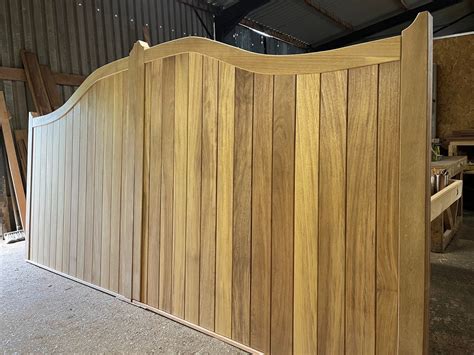 Wooden Driveway Gates In Hardwood Iroko Sapele Fully Boarded Curve Arch