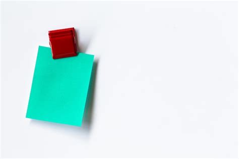 Premium Photo Abstract Empty Sticky Note With Red Magnet On White