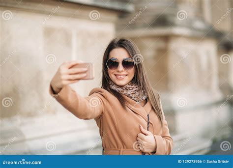 Beautiful Girl In Sunglasses Make Photo On Smartphone Selfie Stock