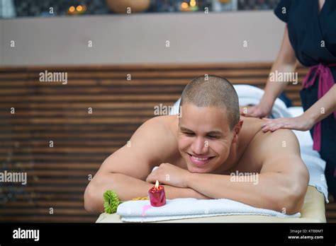 Sports Massage Massage Therapist Massaging Shoulders Of A Male Athlete