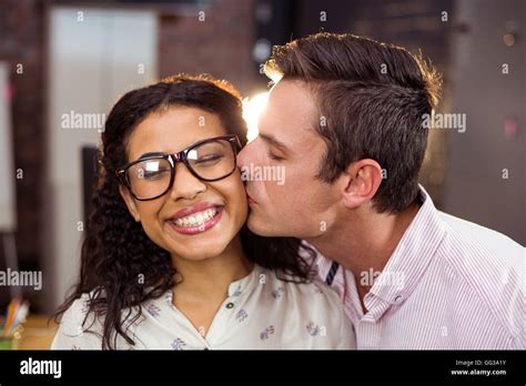 Man Kissing Woman On Cheek Hi Res Stock Photography And Images Alamy