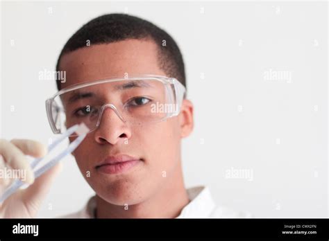 Babe Holding Microchip In Science Lab Stock Photo Alamy