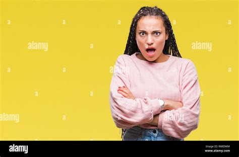 Young Braided Hair African American Girl Wearing Sweater Over Isolated