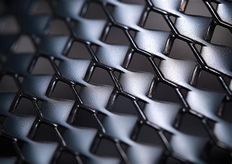 Premium Ai Image Closeup Of Black Metallic Mesh Texture