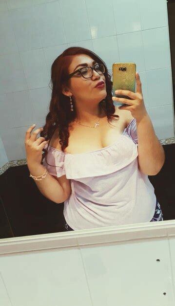 Premium Photo Young Woman Taking Selfie While Standing In Front Of Mirror
