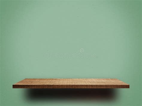Brown Wooden Shelf For Product Display On Green Background Stock Image