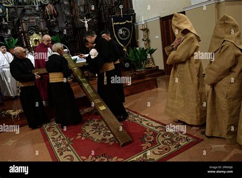 Hooded Penitents Known As Ensacado From The Silencio Del Santisimo Cristo Del Rebate