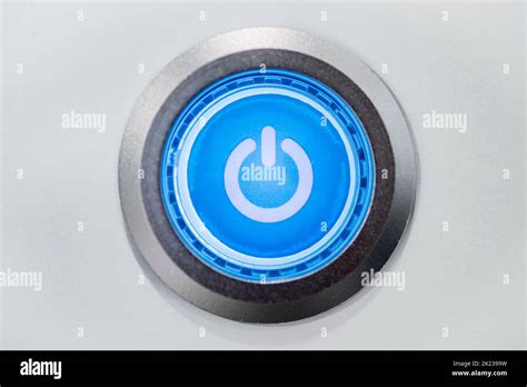 Blue Tuned Power Button Glowing Stock Photo Alamy