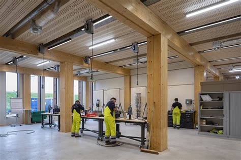 Office Complex Features Rhythmic Arrangement Of Timber Buildings
