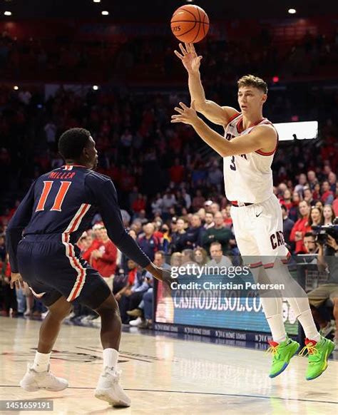 Pelle Larsson Of The Arizona Wildcats Passes The Ball Around Malik