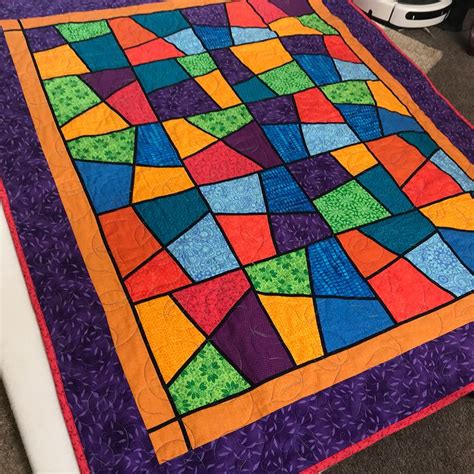 Stack And Slash Stained Glass Quilt Block Technique Stained Glass Quilt Quilts Layer Cake