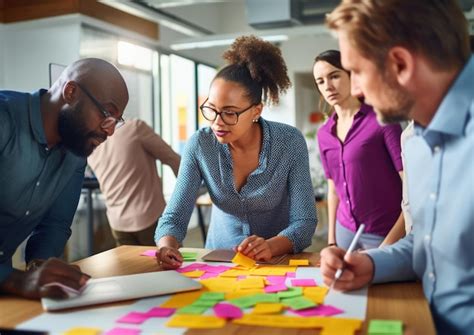 Premium Photo A Group Of People Engaged In A Brainstorming Session Surrounded By Colorful