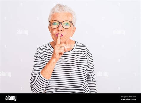 Senior Grey Haired Woman Wearing Striped Navy T Shirt Glasses Over