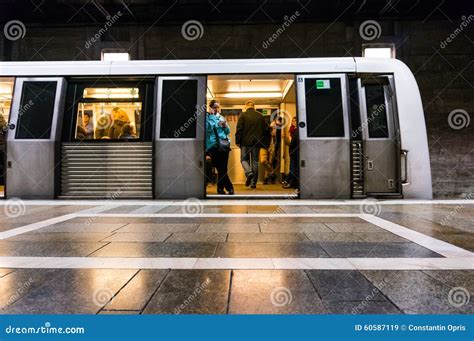 People Boarding A Metro Train Editorial Stock Image Image 60587119