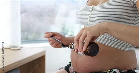 Prenatal Supplements During Pregnancy Pregnant Woman Eating Omega 3