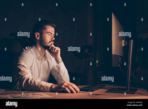 Photo Side Profile Of Serious Pensive Programmer Working Overtime