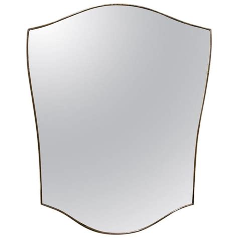 8088 Large Brass Shield Mirror Dorian Caffot De Fawes Ltd Antiques
