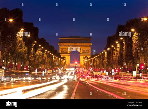 Arc de Triomphe and Champs Elysées at night Stock Photo Alamy