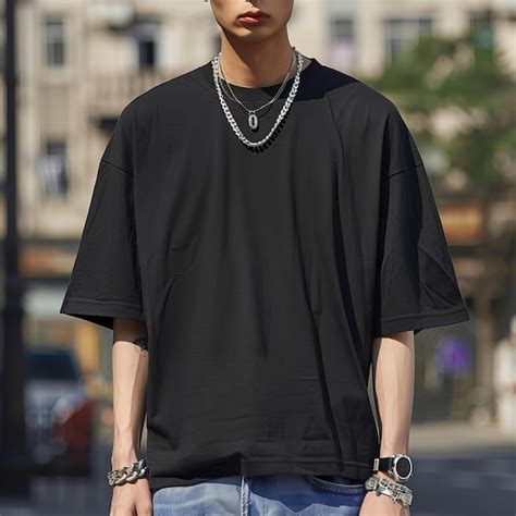 A Man Wearing A Necklace And A Necklace Is Standing On A Street