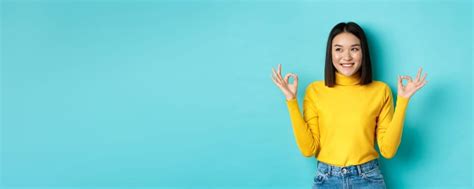 Full Length Of Happy Asian Tourist Girl Travelling Abroad Posing With