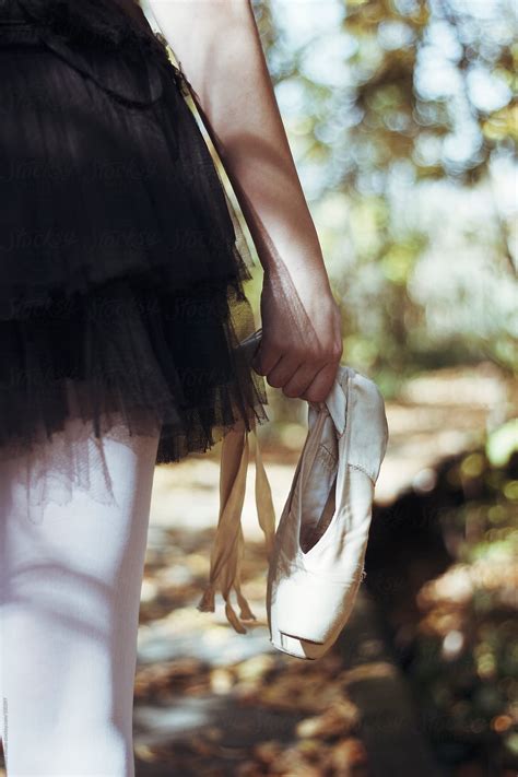 Ballerina Holding Her Ballet Shoes By Stocksy Contributor Jovana