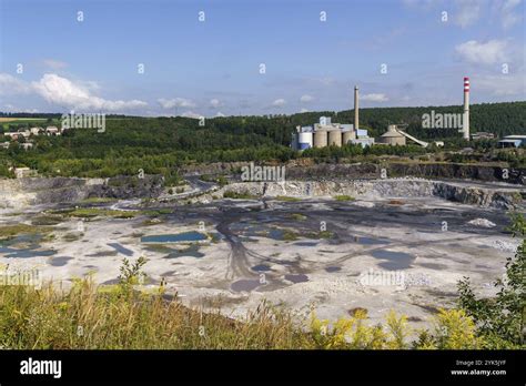 opencast mining quarry with machinery and mining equipment limestone