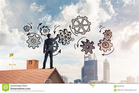 Mister Boss On Brick Roof Standing With Back And Draw Teamwork C Stock