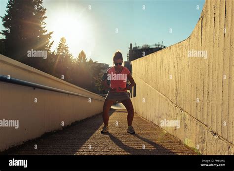 Muscular Active Athletic Young Woman Showing Muscles Of Hands Stock