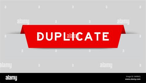 Red Color Inserted Label With Word Duplicate On Gray Background Stock