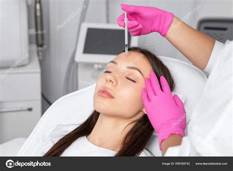 Cosmetologist Makes Rejuvenating Wrinkle Injections Chin Cheeks Neck