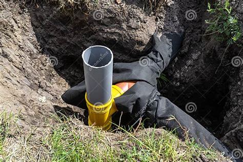 Overflow And Infiltration Well Connected To Drainage Pipes Dug In A