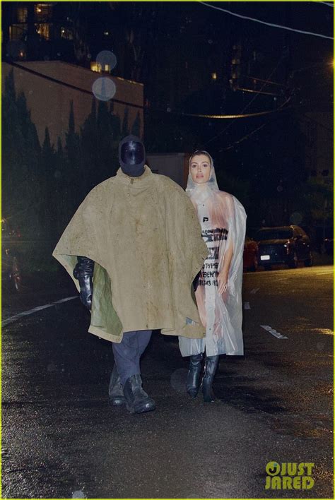 Kanye Wests Wife Bianca Censori Braves The Rain In See Through Poncho