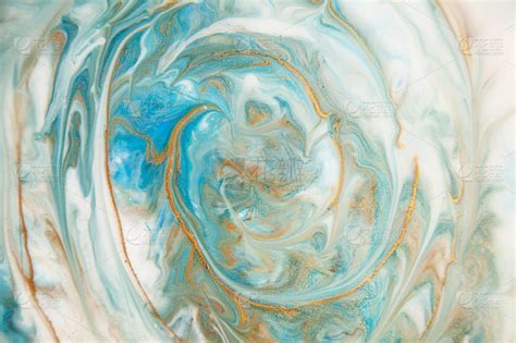 环氧树脂抽象画。蓝色、白色和金色的大理石漩涡。抽象现代脉络液体背景
