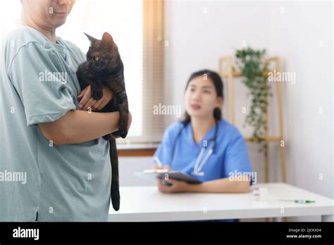Pet Care Concept Female Veterinary Is Writing Prescription On