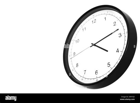 Part Of Analogue Plain Wall Clock On White Wall Background Four O