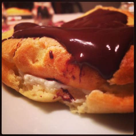 Homemade Choux Pastry Buns With Vanilla Cream And Chocolate