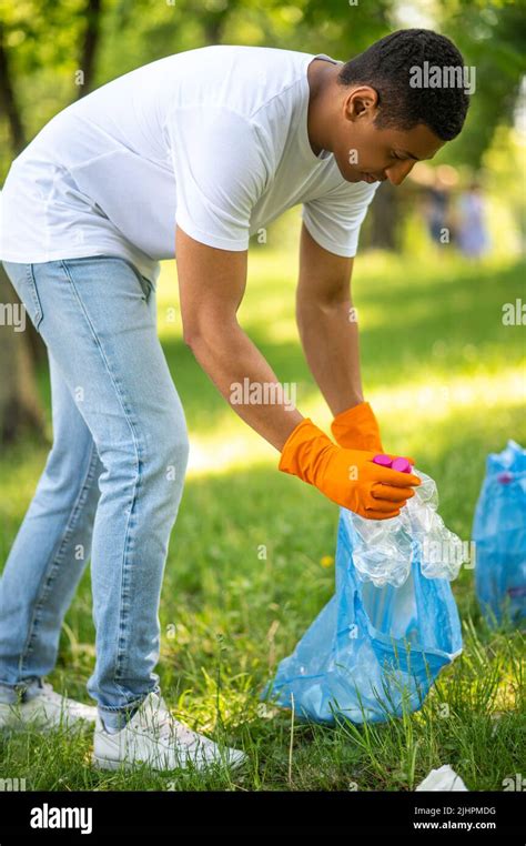 Recycling Man Putting Waste Hi Res Stock Photography And Images Alamy
