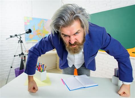 Premium Photo Back To School Angry Teacher In Glasses Learning