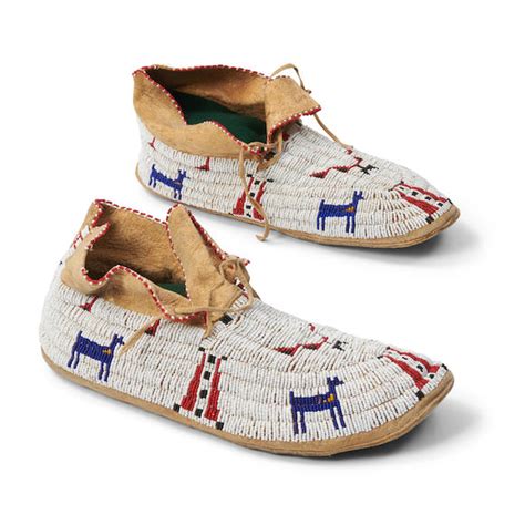 Bonhams Skinner A Pair Of Plains Beaded Hide Moccasins Lg 10 12 In
