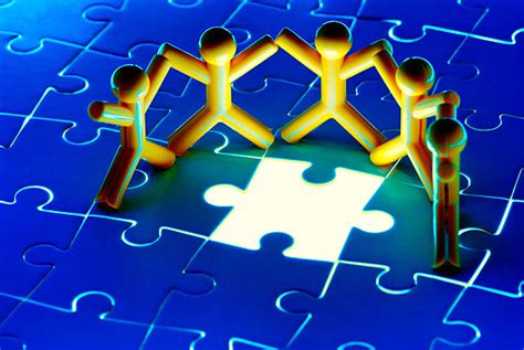 Team Work On Solving Puzzle Problem Communication Success Group Photo