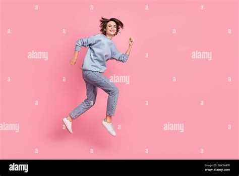 Full Body Profile Photo Of Sweet Millennial Lady Run Wear Jumper Jeans