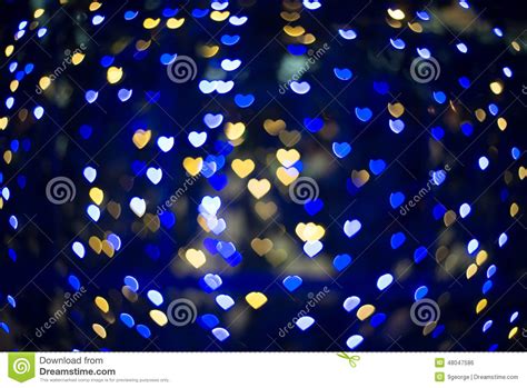 Предпосылка Bokeh сердца Валентайн сердец красное S золота дня
