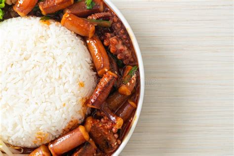 Stir Fried Squid Or Octopus With Korean Spicy Sauce Rice Bowl Stock