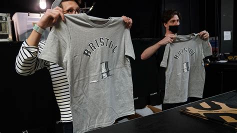Banksy Thousands Queue For T Shirt By Street Artist To Raise Cash For