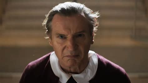 Liam Neeson Is Beating Up Bank Robbers While Wearing A Skirt In First