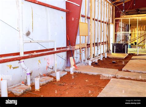Future Plumbing Concrete Floor With Exposed Drainage Pvc Pipe Endings