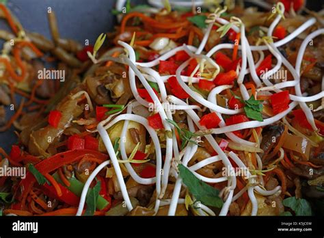 Asian Traditional Meal Of Stir Fried Assorted Vegetables In Wok Pan Close Up High Angle View