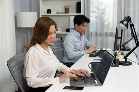 Beautiful It Developer Analyzing Program Application Beside Coworker