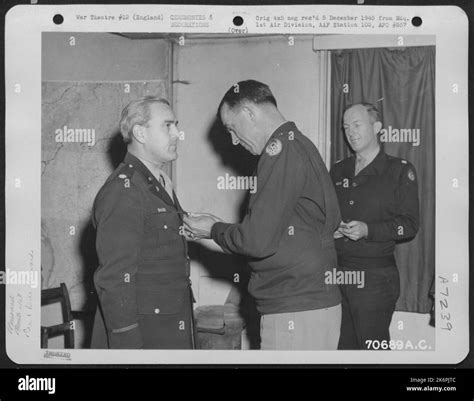 Colonel Wright Attached To Hdq 1st Bomb Division Is Presented An Award By Brig General