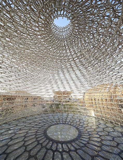 An Intricately Designed Ceiling In The Middle Of A Building